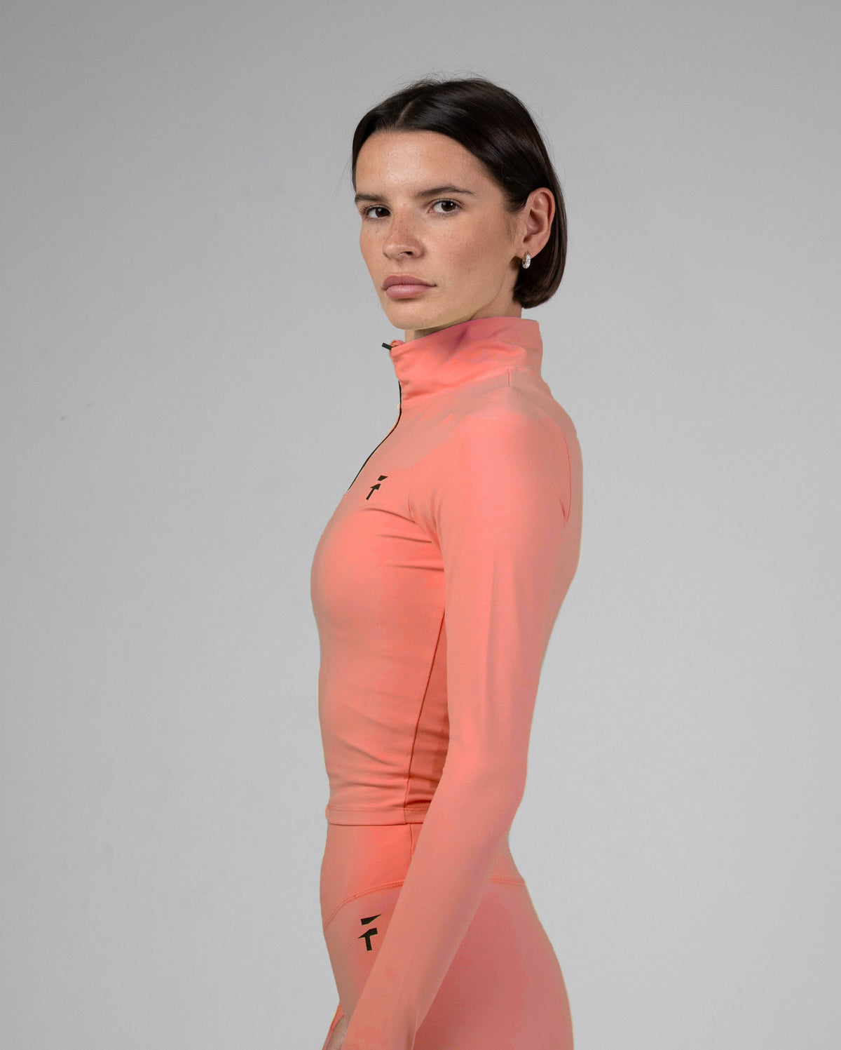 ULTRA SOFT ESSENTIAL ZIP-UP BODY FIT TOP - Coral